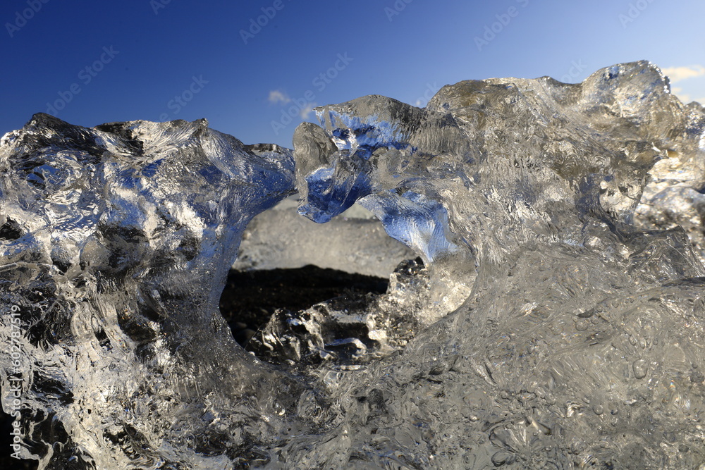 View of an iceberg on the beach of Breiðamerkursandur which is a ...