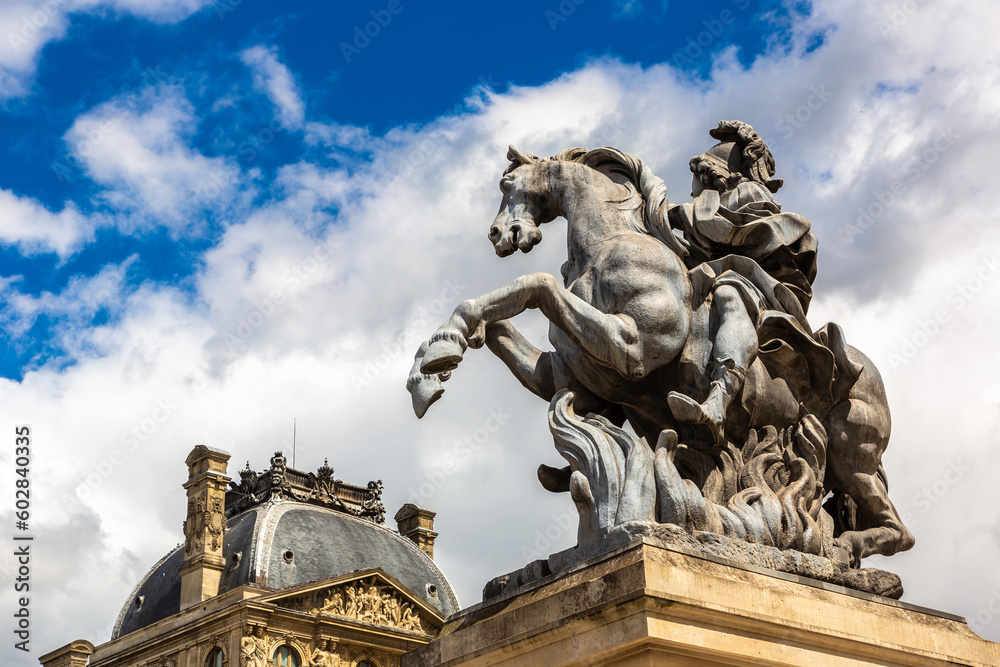 Louis XIV Statue and The Louvre - is one of the world's largest museums ...