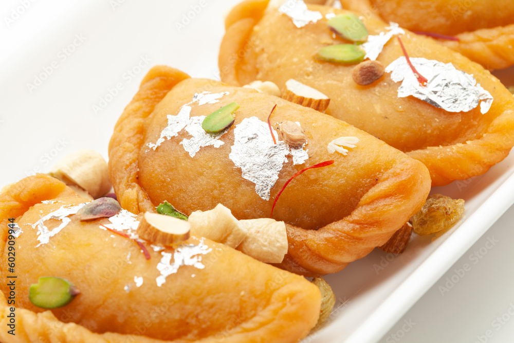 Close-up of Indian Traditional sweet "Gujiya", The sweet is made of ...