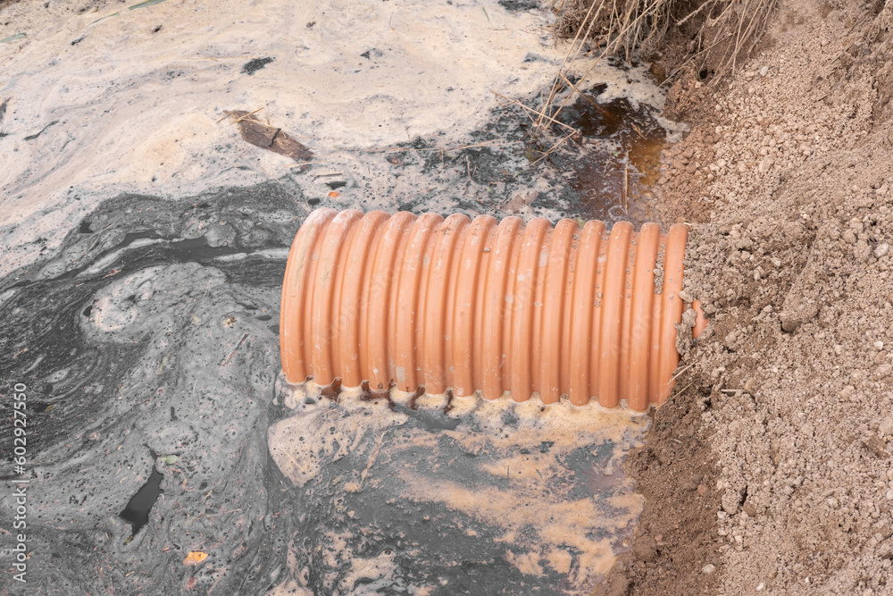 Drainage pipe with water stream flowing. Storm water management in ...