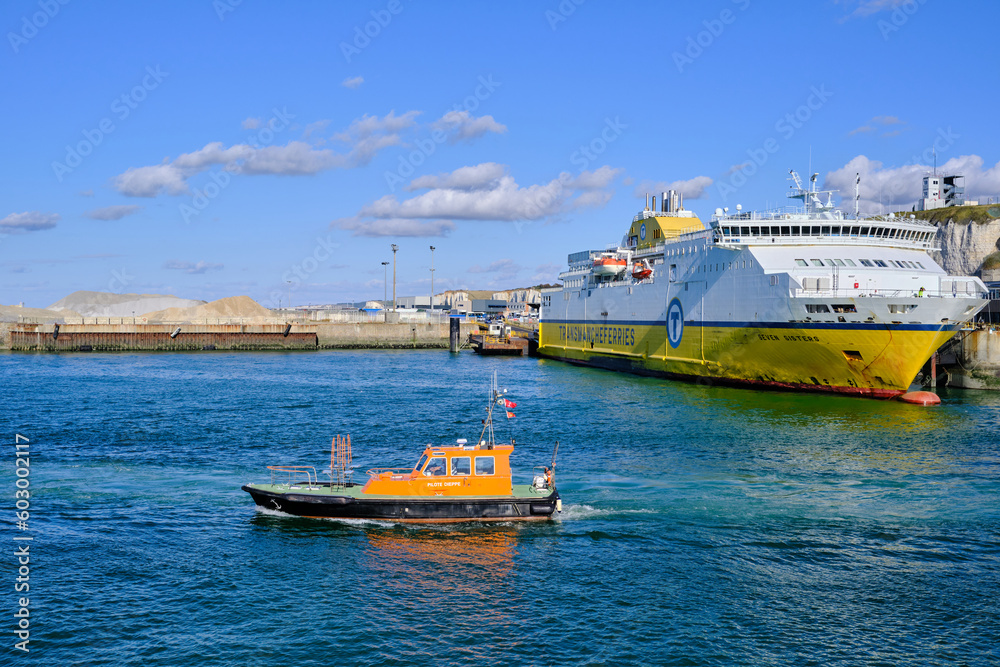 Dieppe, Normandy, France - September 21 2022: Pilot boat saling past a DFDS passenger ferry ...