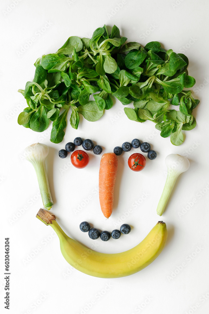 Visage avec des fruits et légumes bio Stock Photo | Adobe Stock