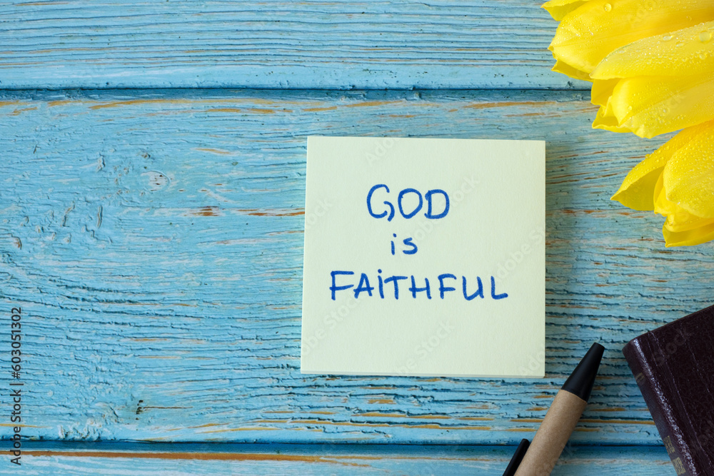 God is Faithful, handwritten quote on note with pen and tulips on ...