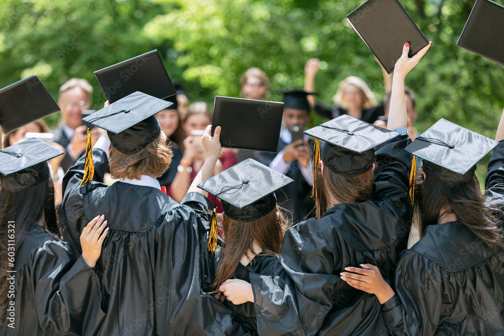 Grad: Group Of Graduate Friends Pose For Parents Stock Photo | Adobe Stock