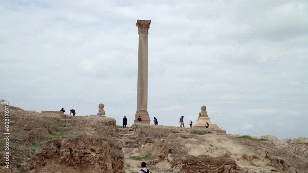 Alexandria, Egypt. December 2022. Some tourists take pictures next to ...