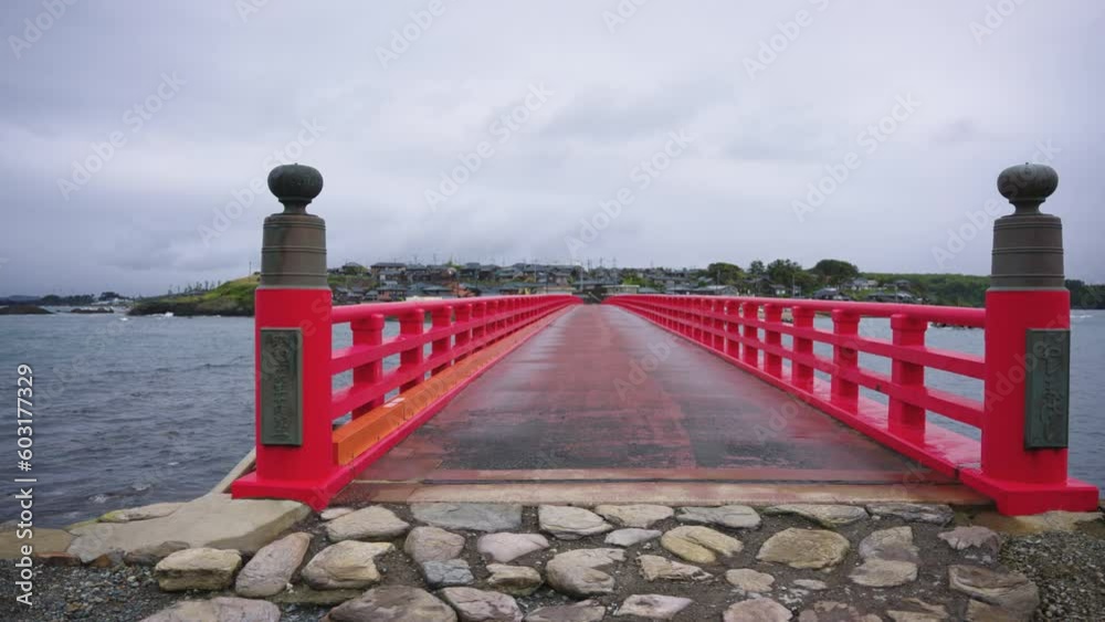 Tilt Reveal of Long Red Bridge to Oshima Island in Fukui Prefecture ...