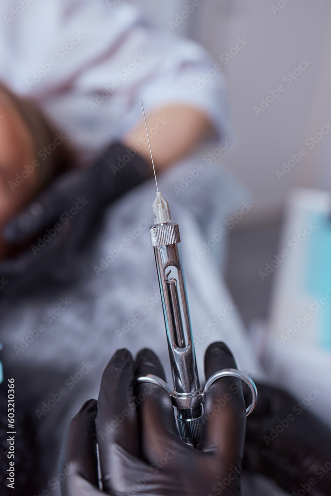 Little girl at dentist office, getting local anesthesia injection into ...