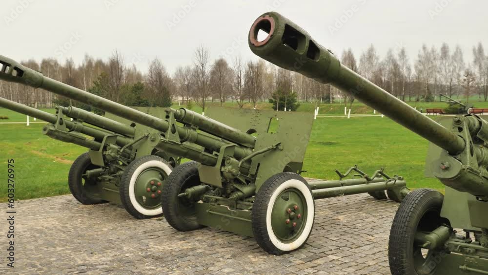 Three 76-mm ZIS-3 howitzer guns. An exhibition of World War II military ...