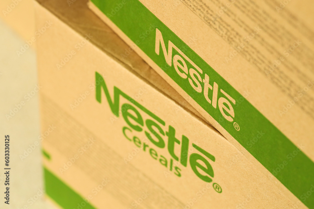 KYIV, UKRAINE - MAY 4, 2022 Big cardboard boxes with logo of Nestle ...