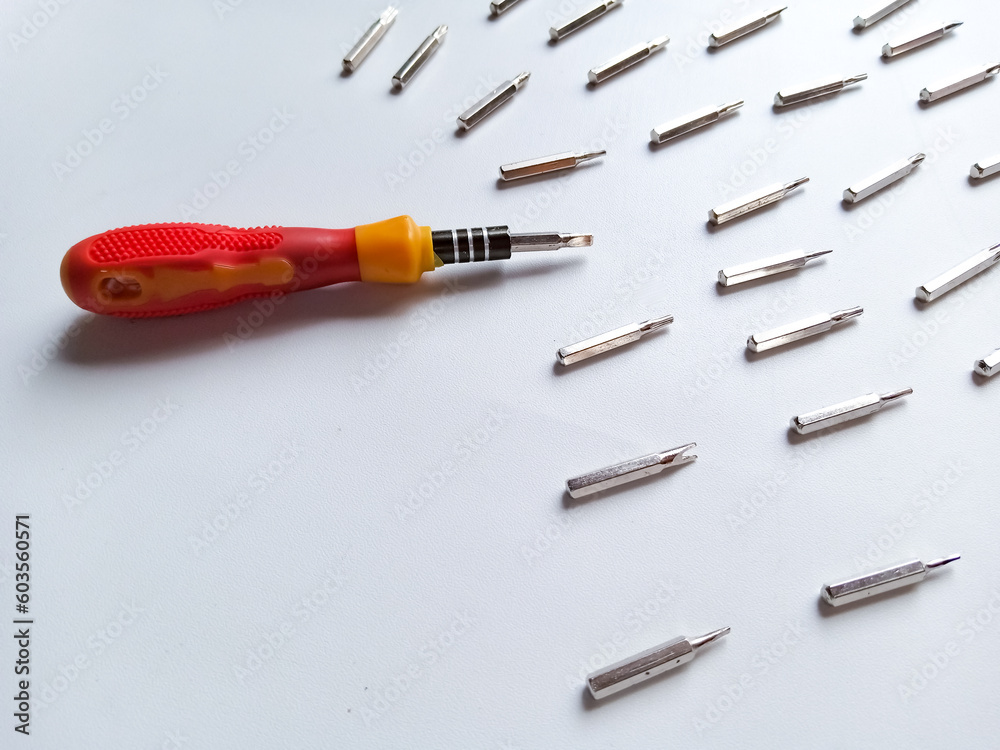 The screw-driver with a set of various nozzles. Interchangeable ...