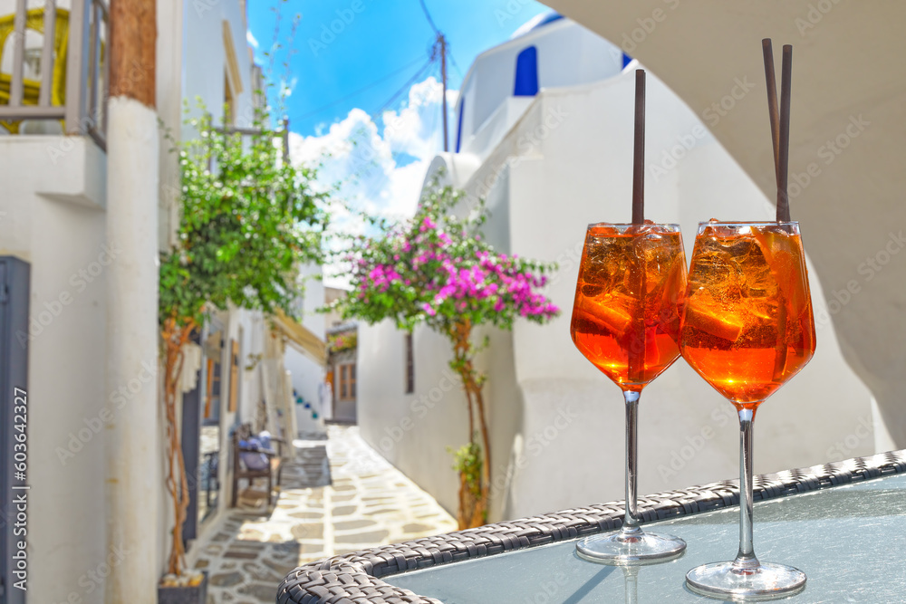 Two Aperol Spritz in a traditional village on a Greek island of the ...
