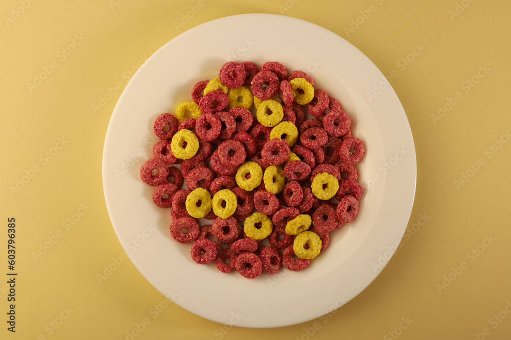 delicious sweet healthy breakfast corn flakes in rings of different ...