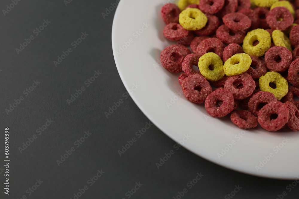 delicious sweet healthy breakfast corn flakes in rings of different ...