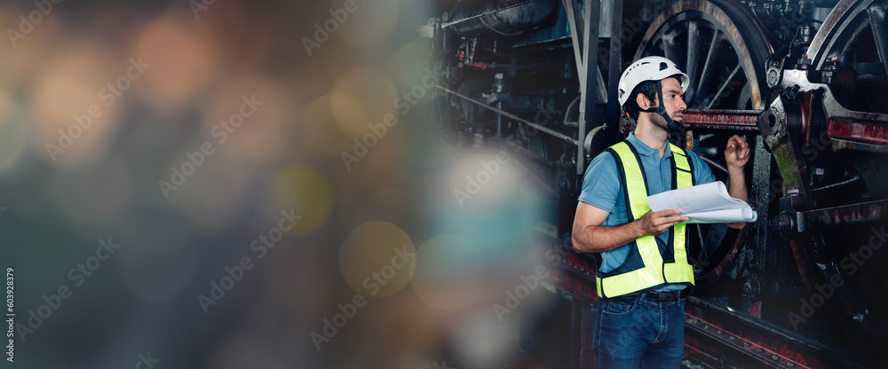 Engineer railway wearing safety uniform and helmet under checking under ...