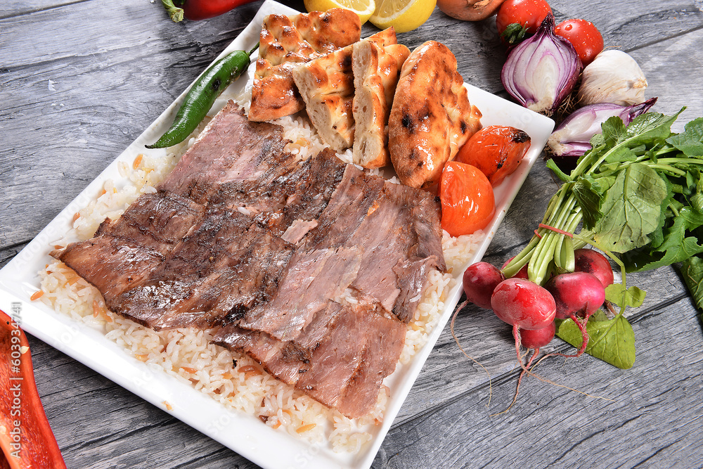 Doner with Rice, pita and grilled vegetables Stock Photo | Adobe Stock