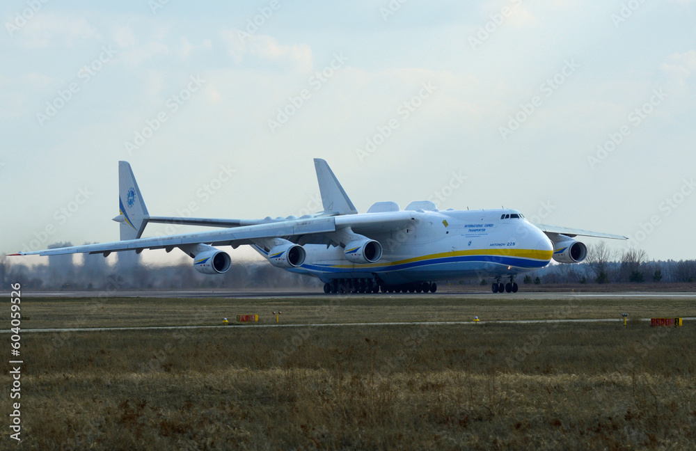Airlift cargo aircraft Antonov 225 Mriya taking off from a runway of ...