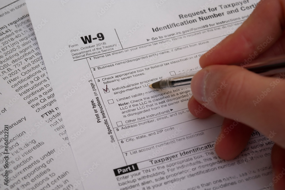 Tax Form W-9 Request for Taxpayer Identification Number and Certification, business concept ...