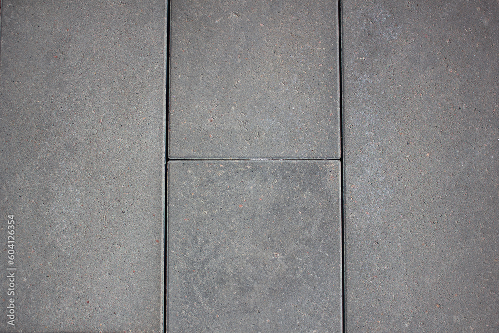 Gray background of a brick pavement.Background of a block of gray stone ...