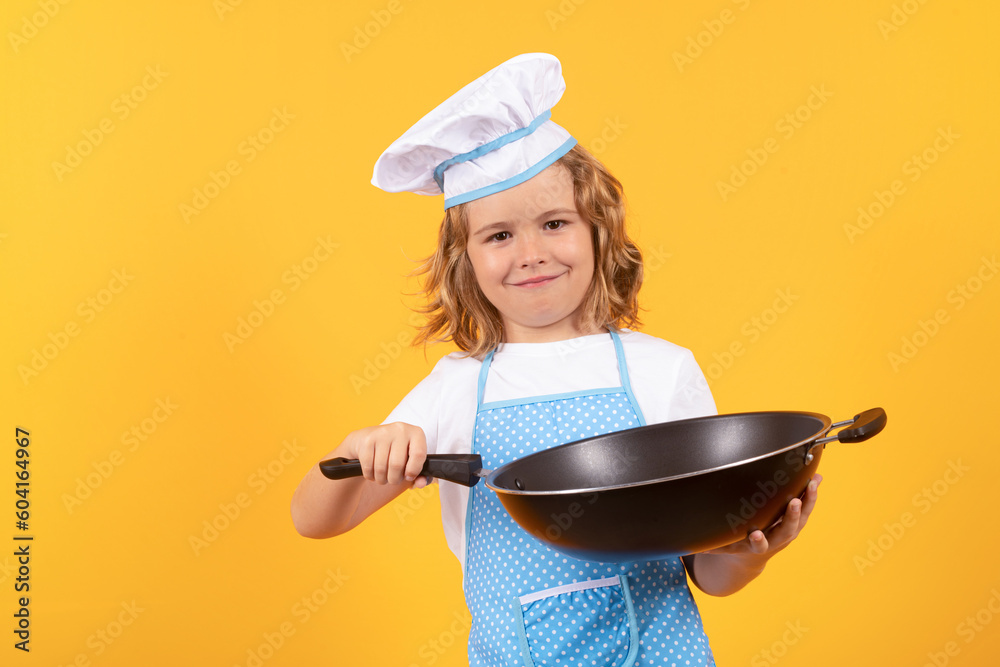 Little cook with cooking pan. Chef kid boy making healthy food ...