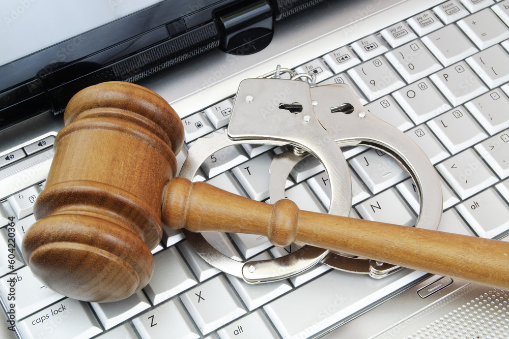 Online financial fraud and punishment concept. Judge gavel and ...