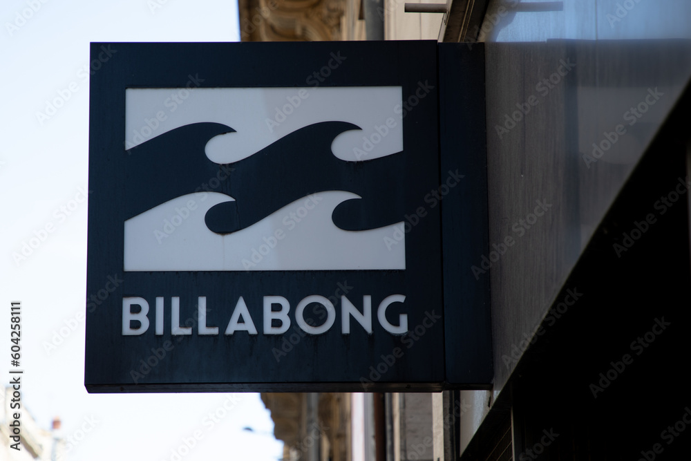 billabong sign text boutique and logo brand chain on facade store wall ...