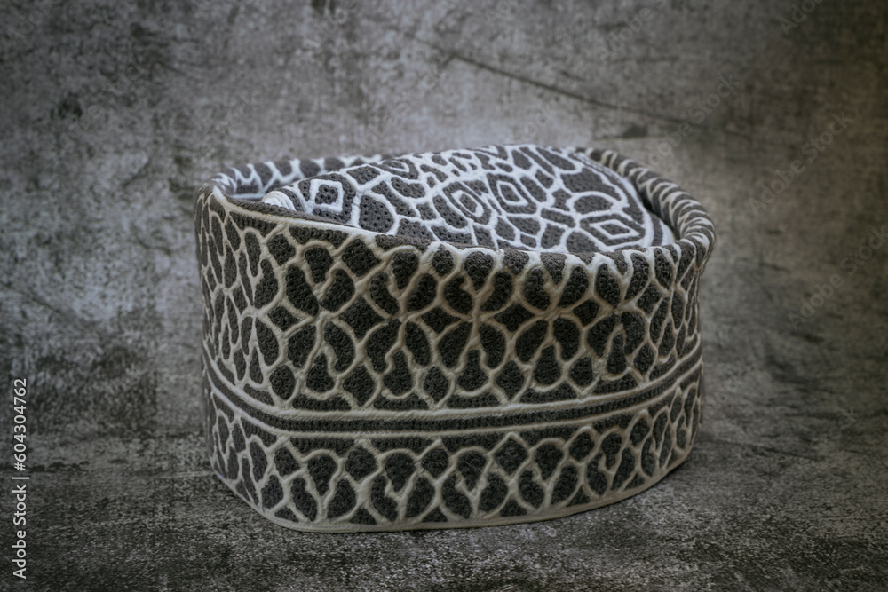 A traditional Omani cap in beautiful colors called kumma , which is ...