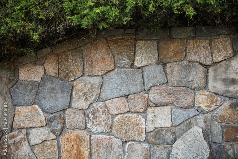 The rugged beauty of the stone wall texture reveals strength and ...