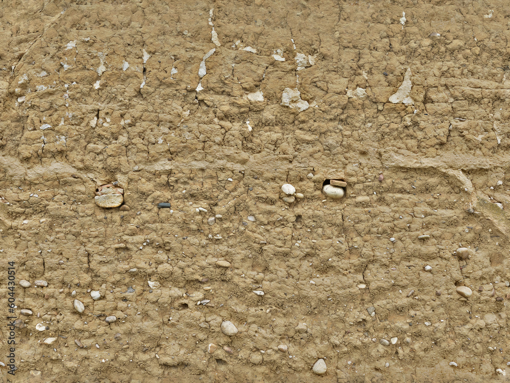 Seamless dry mud wall texture, showing stones and cracks Stock Photo ...