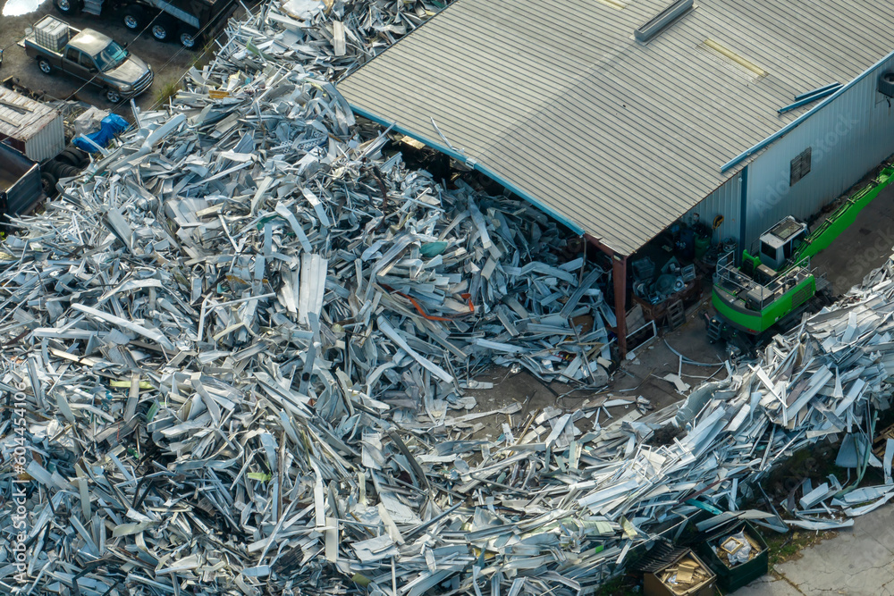 Beg pile of scrap aluminum metal siding from ruined houses after ...