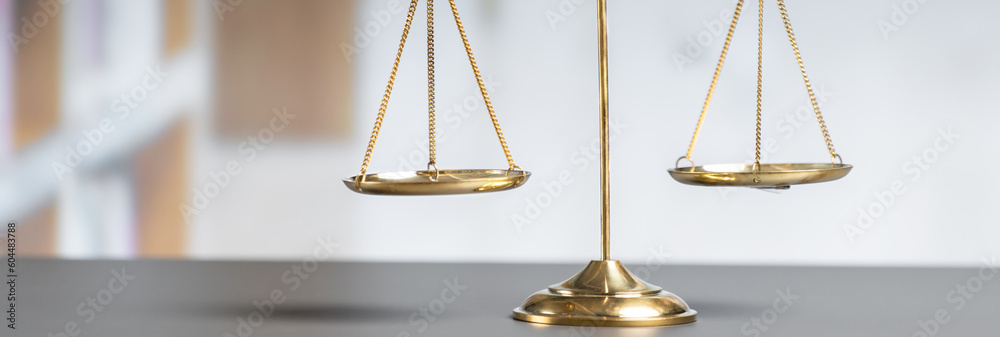 Shiny golden balanced scale in court library background as concept ...