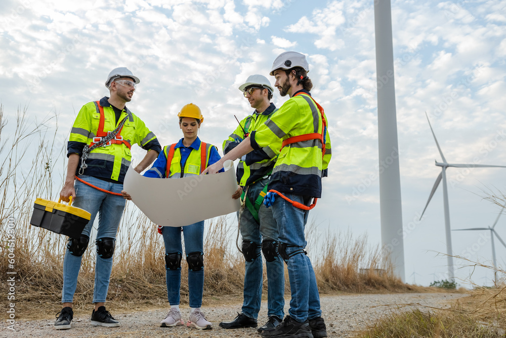 Foto de Teamwork engineer worker wearing safety uniform holding and ...