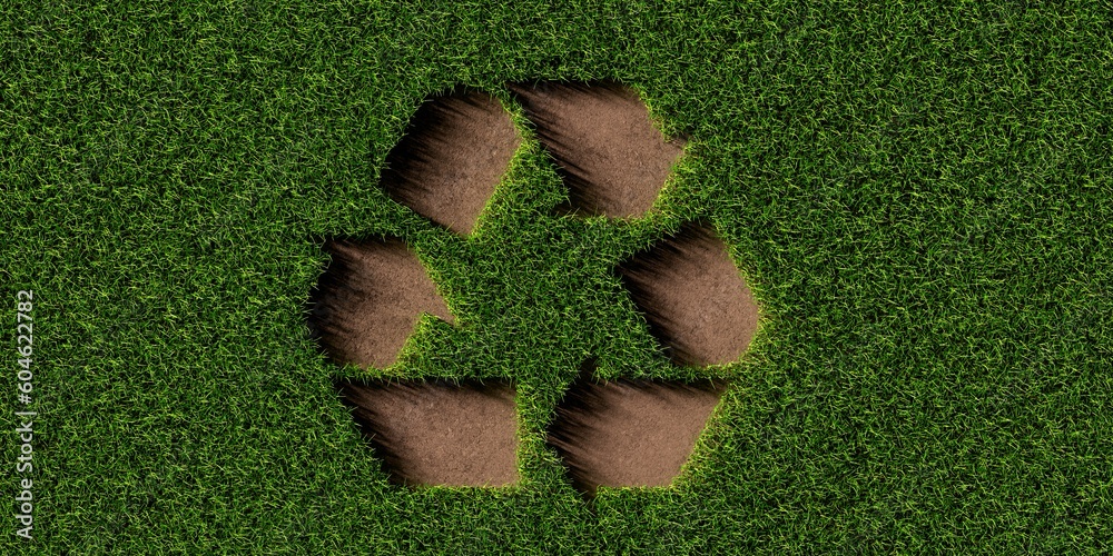Recycling symbol cut out from grass on brown soil background, ecology ...