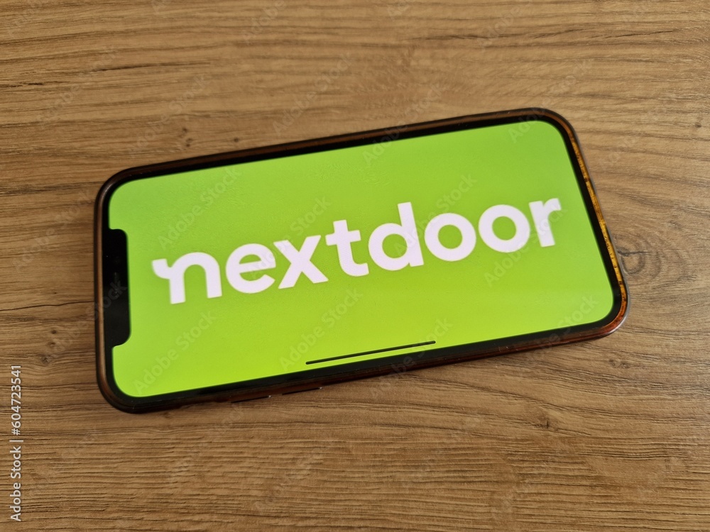 Nextdoor logo displayed on mobile phone Stock Photo | Adobe Stock