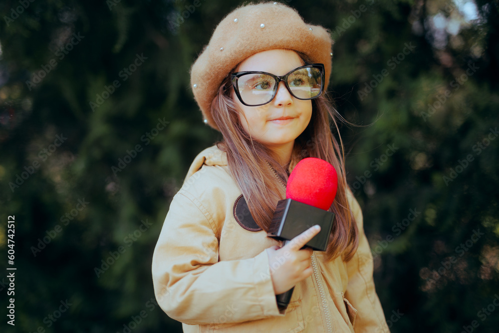 Little Girl Holding the Microphone Ready to Become a Reporter. Cute ...