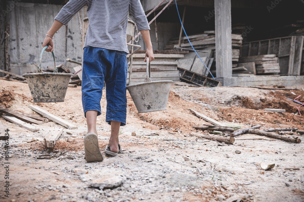 boys labor work in the construction site, Against child labor, Poor ...