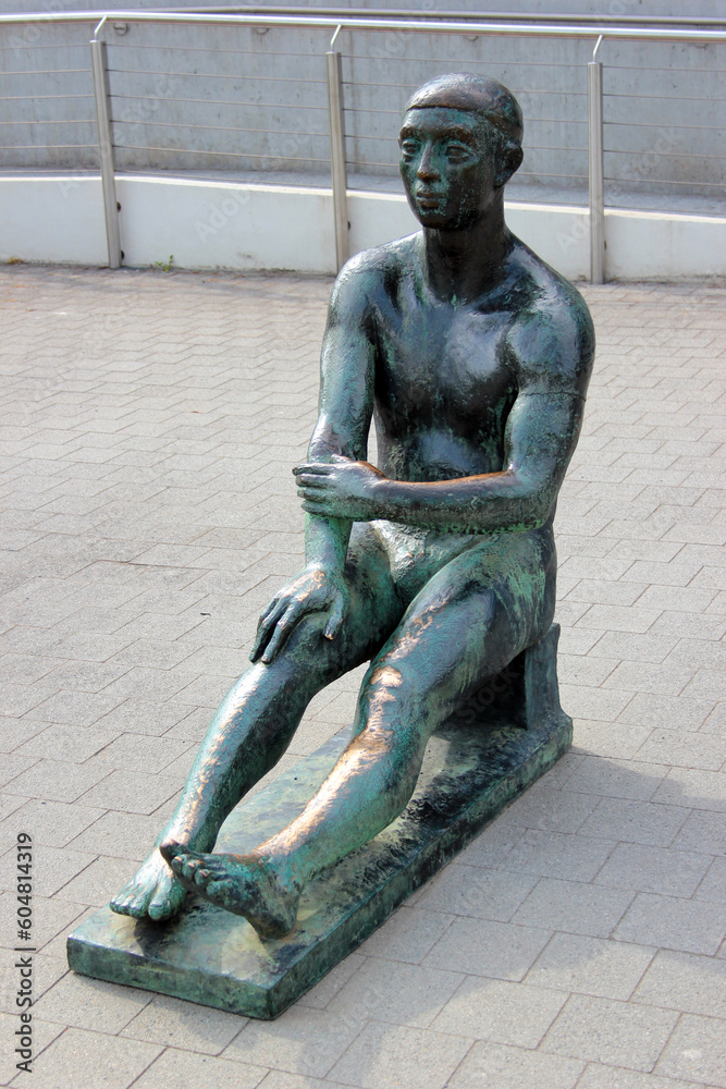Gera, Germany - May 19, 2023: Sculpture of a swimmer in front of ...