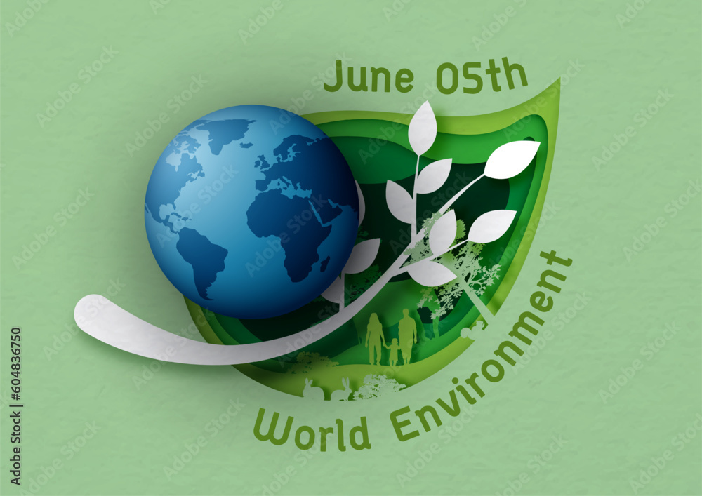 Giant global with origami paper cut in tree brunch and wording of world ...