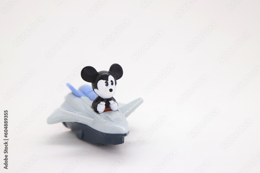 Mickey Mouse flying in a spaceship from one of the attractions of the ...