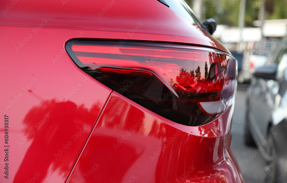 Rear, back car-light of red car parking in outdoor parking area. Stock ...
