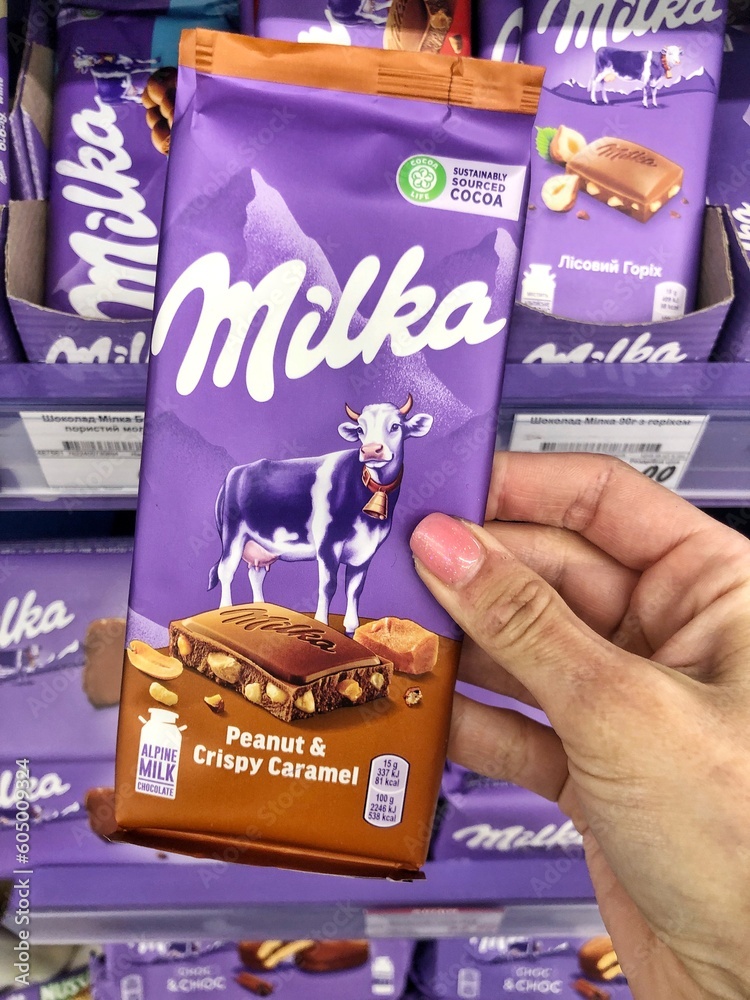 28.04.2023, Ukraine, Kharkiv, Milka chocolate on store shelves. Many ...