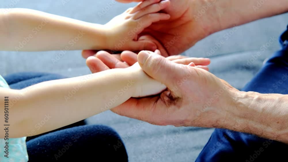 adult male hands holding kid hands, Family Help Care Concept, small ...
