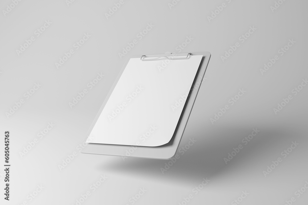 White clipboard floating in mid air with shadow on white background in ...