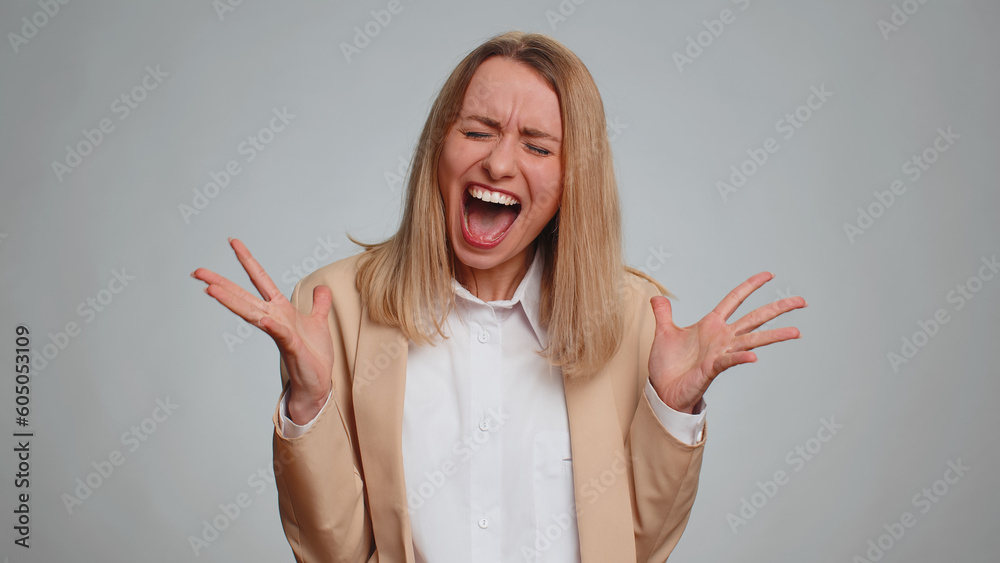 Sad woman in suit screams yell from stress tension problems feels ...