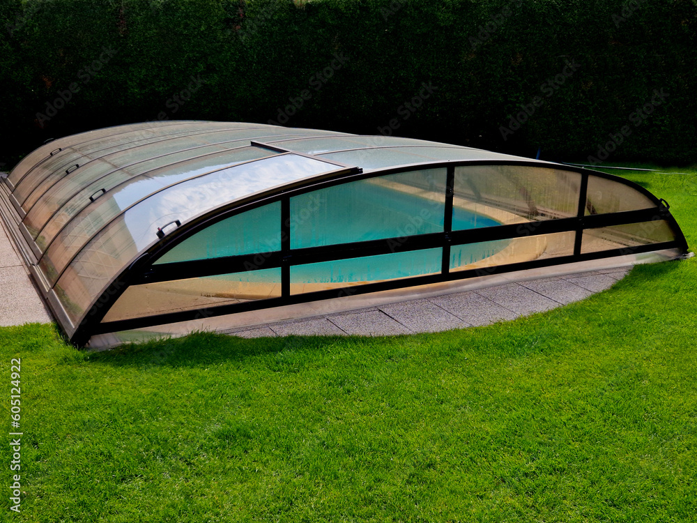 folding pool roof. cover made of aluminum and plexiglass runs on rails ...
