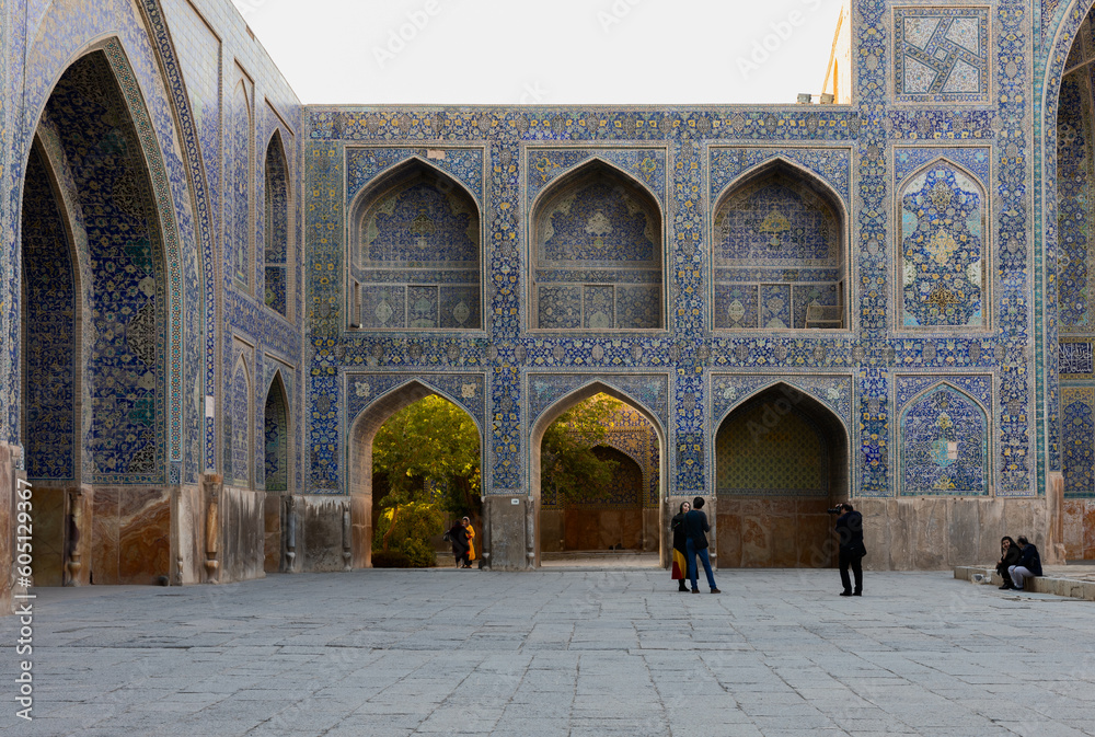 Arched walls and iwan in courtyard of Shah Mosque on south side of ...