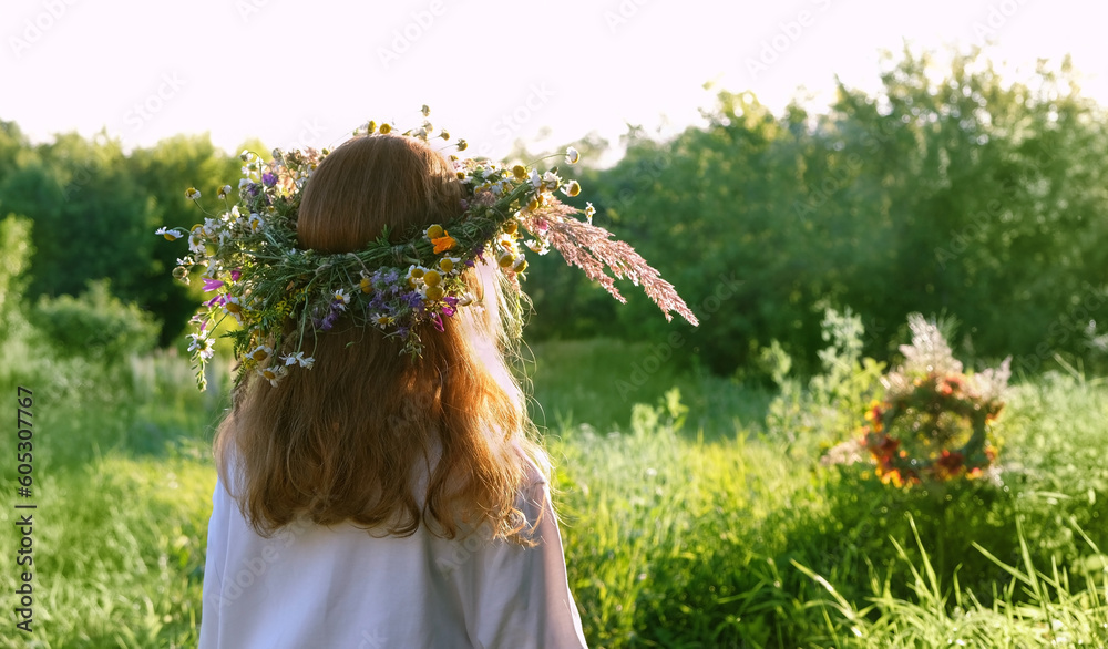 Girl in flower wreath on meadow, sunny green abstract natural ...