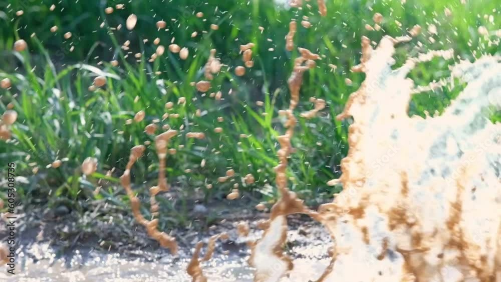 Mud splashes from under the bicycle wheel. Dirty water and mountain ...