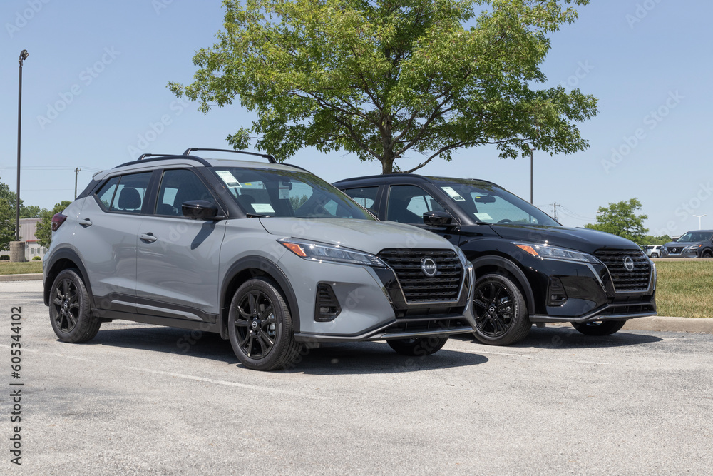 Nissan Kicks Crossover SUV display at a dealership. Nissan offers the ...