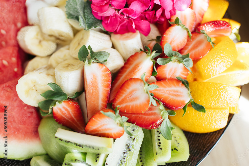 Fruit salad background. Closeup fruits. Red strawberry cross section ...