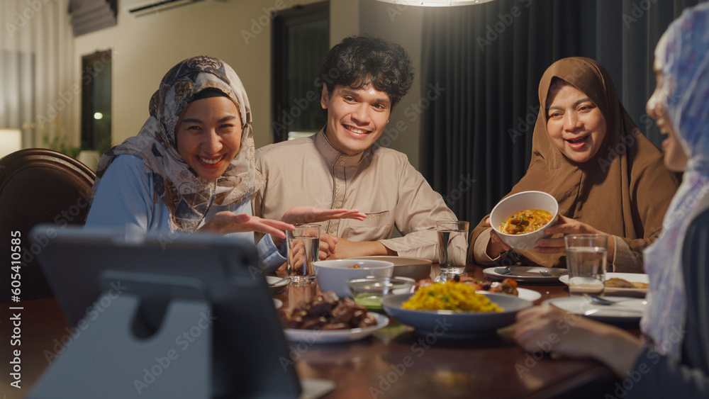 Happy Asian muslim family celebrate long distance with cousin video ...